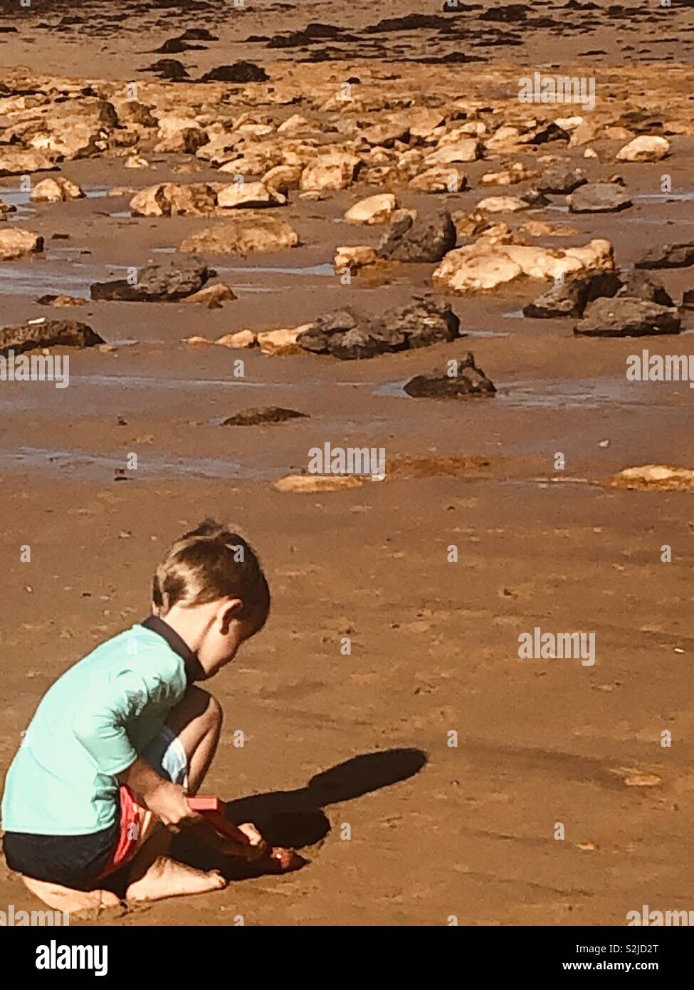 Child playing in sand hi-res stock photography and images - Alamy