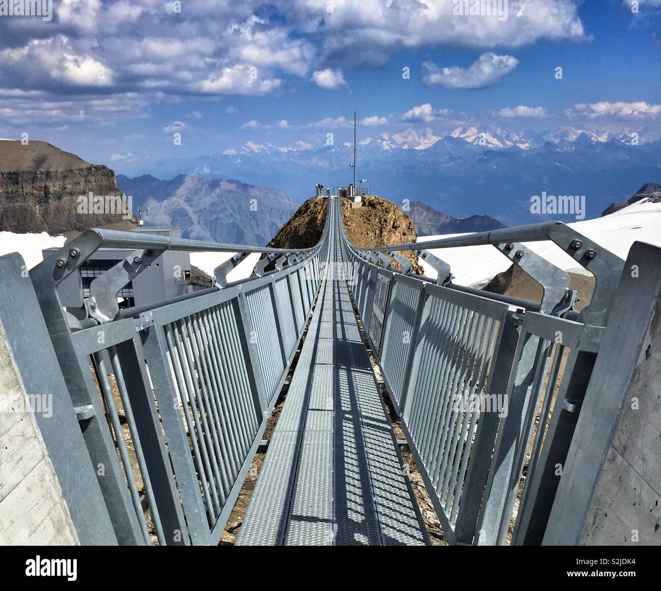 Mountain bridge in Swiss Alps Stock Photo - Alamy