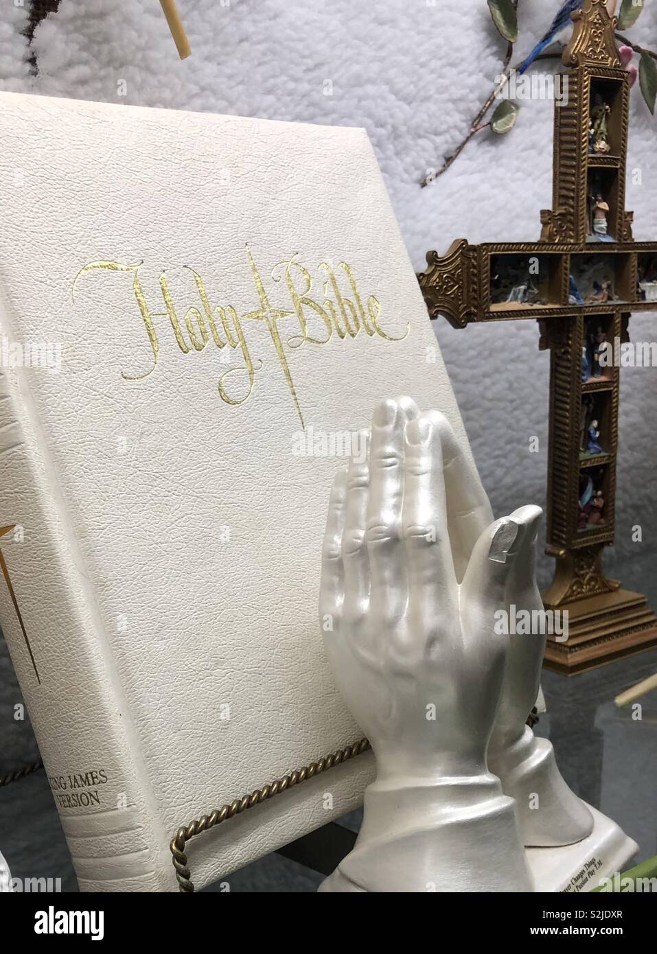 Praying Hands With Bible And Cross