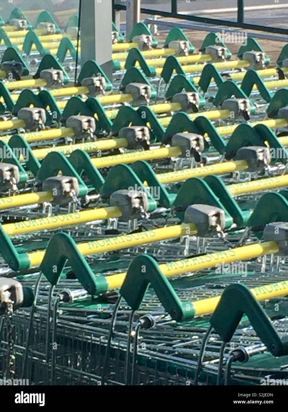 Group of supermarket trolleys at Morrisons. Maidstone Kent Uk. Saturday ...