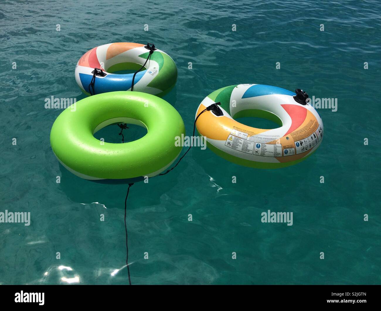 Colourful rings in the sea hi-res stock photography and images - Alamy