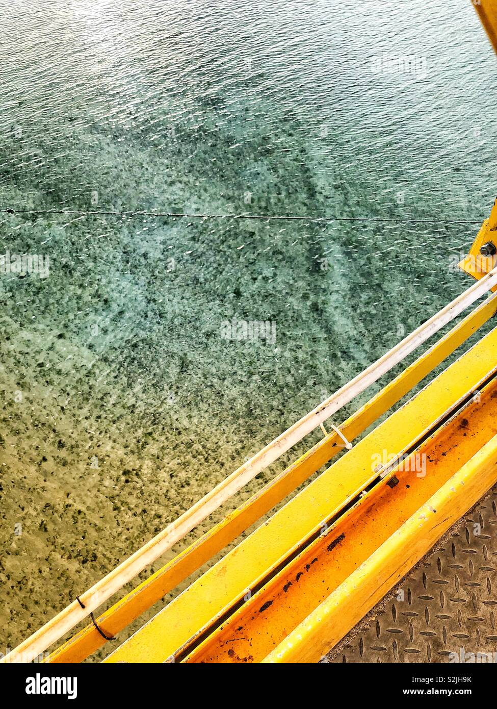 Water under the yellow bridge Stock Photo - Alamy