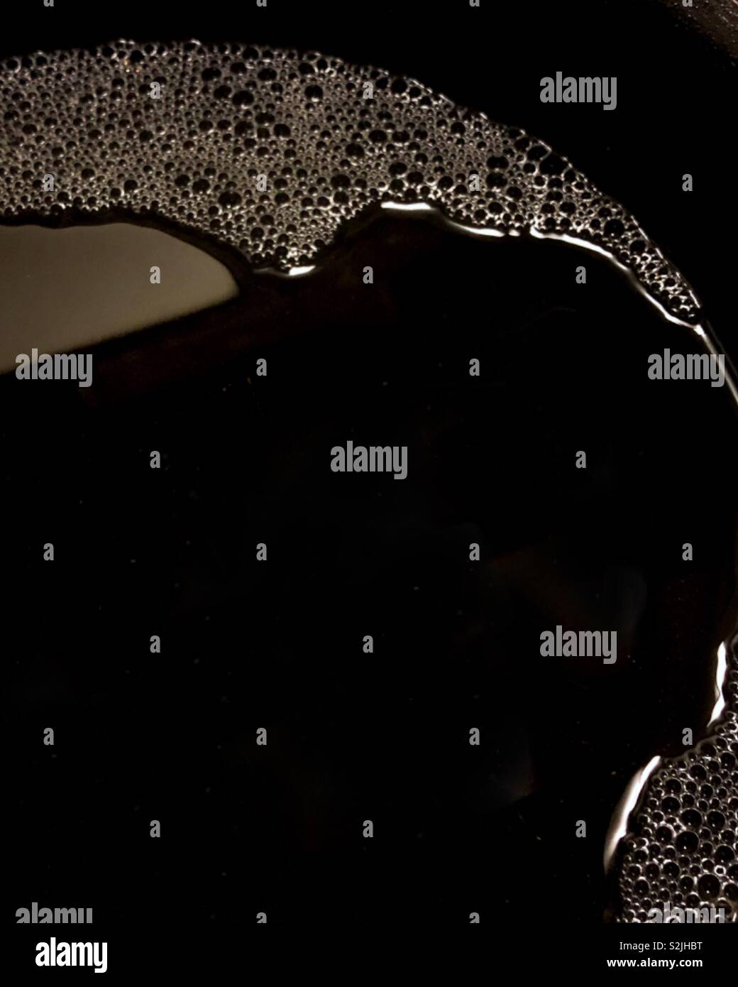 Frying pan soaking in the sink Stock Photo - Alamy