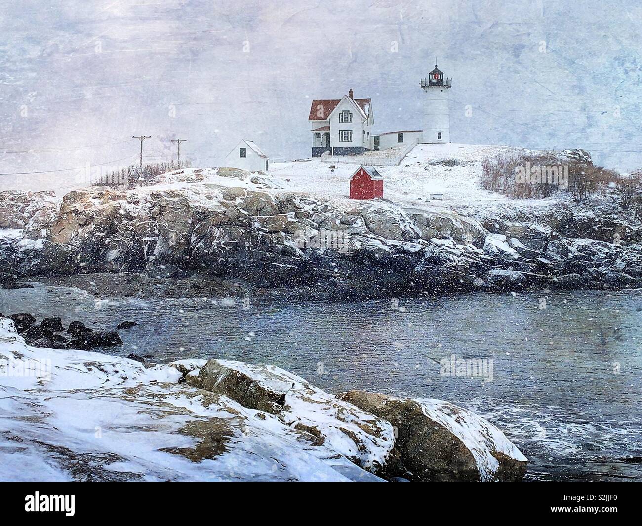Snowy Day at Cape Neddick (Nubble) Lighthouse, York Beach, Maine Stock ...