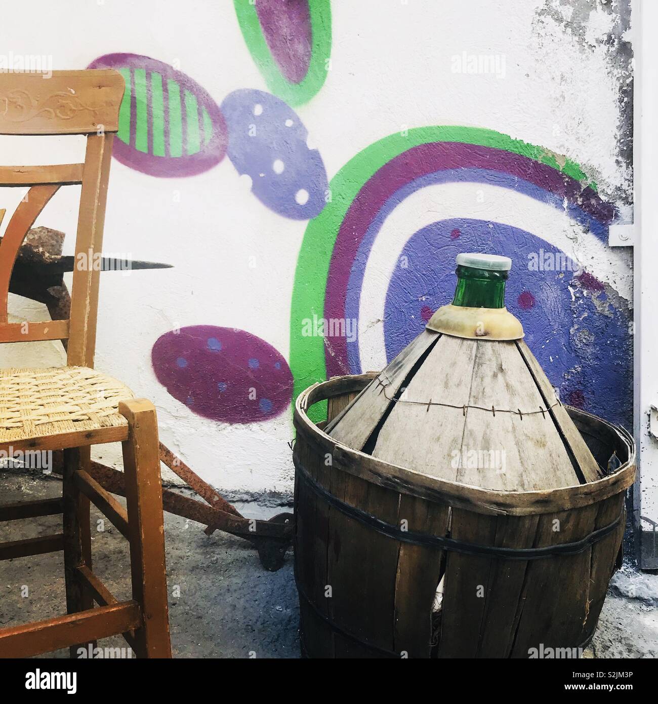 Chair and Demi-John, the Farm, Favara, Sicily, 2018 Stock Photo - Alamy