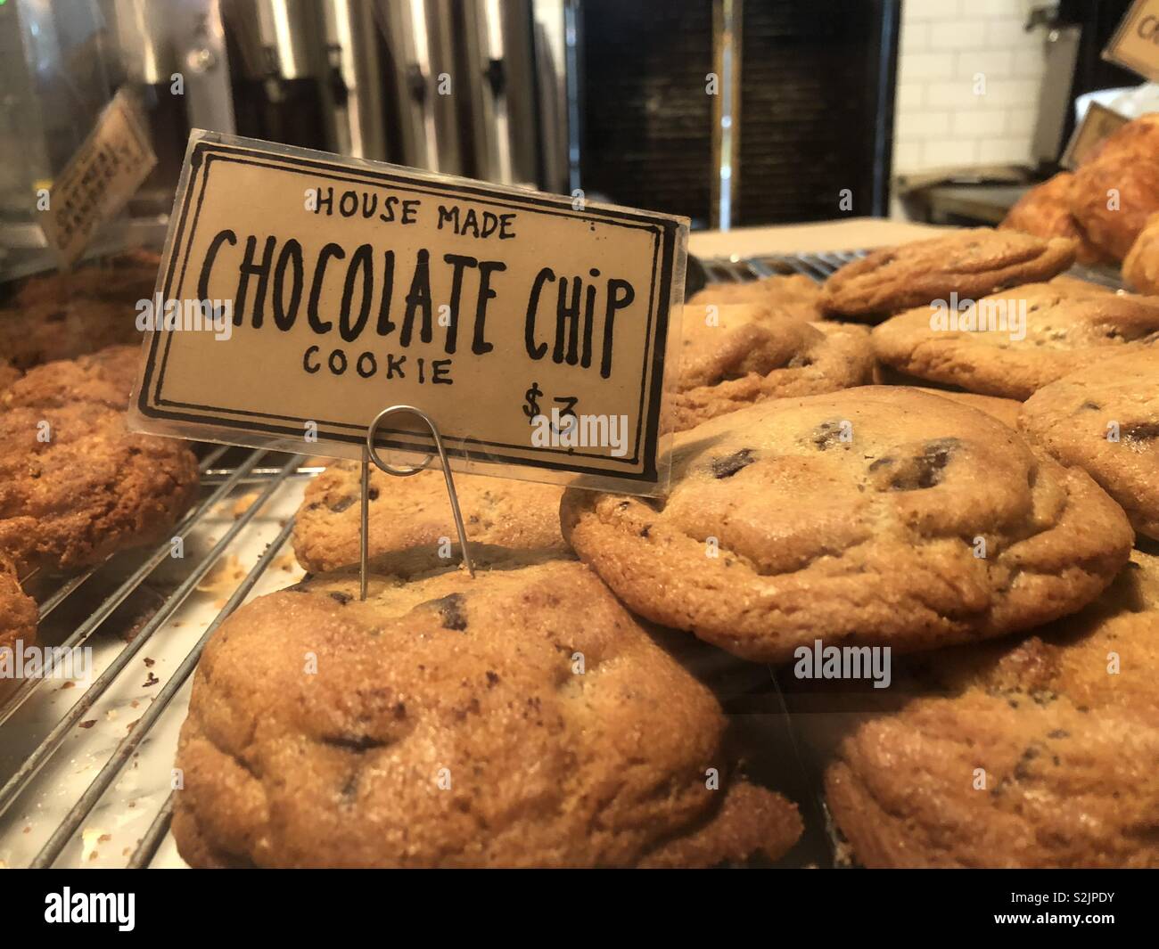 Warm chocolate chip cookies Stock Photo - Alamy