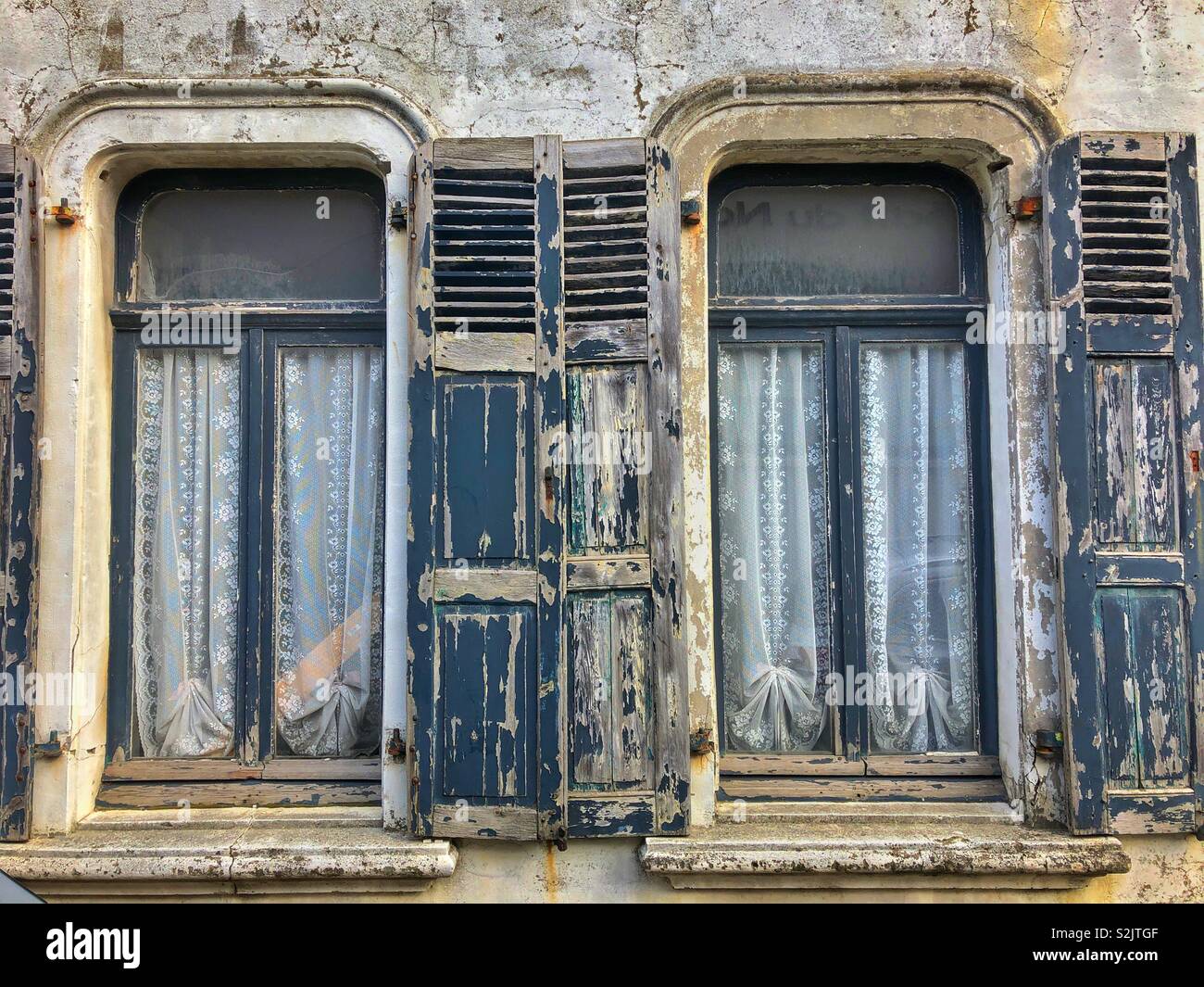 Old shuttered windows in a french town Stock Photo - Alamy