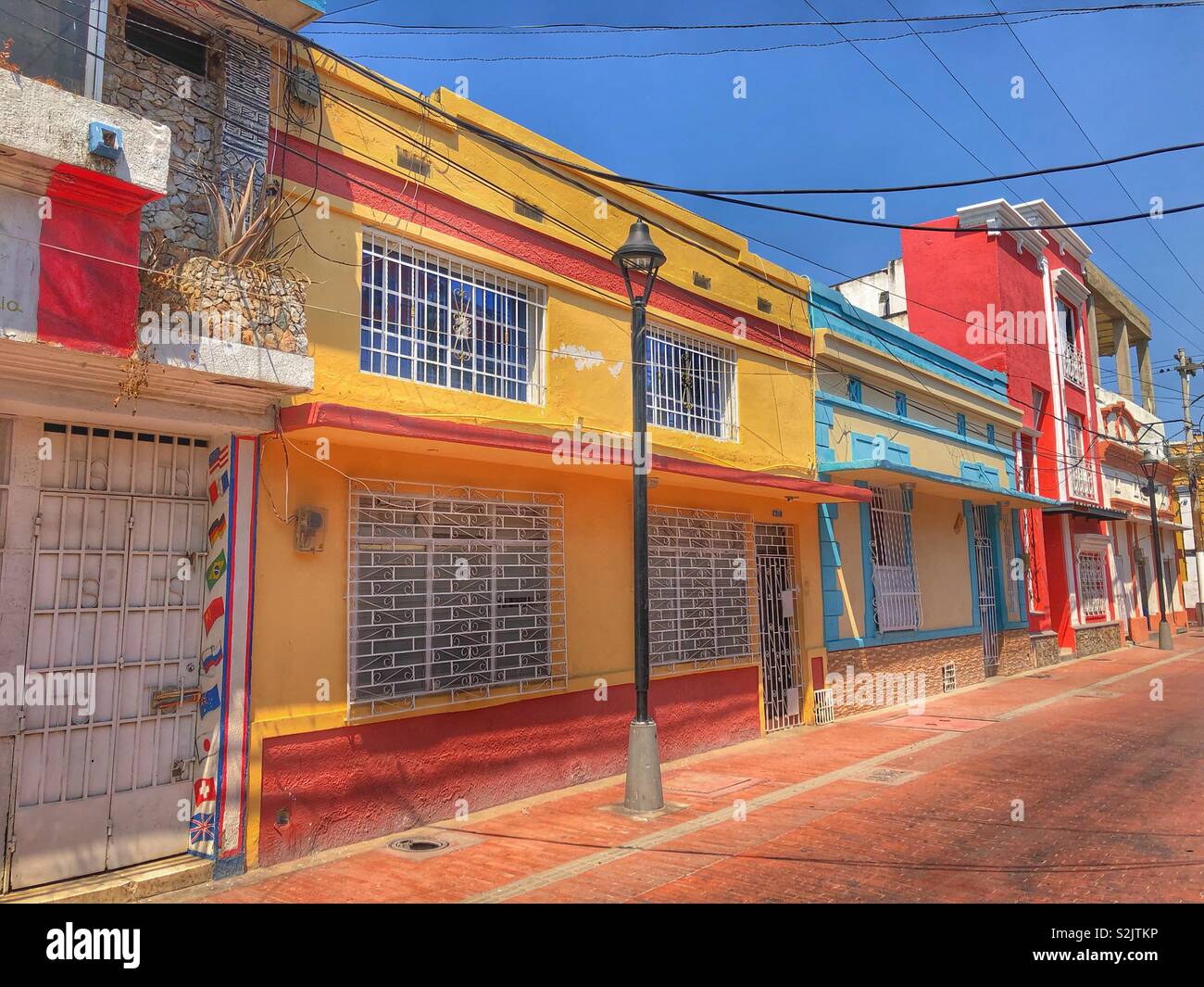 Colourful houses on an empty street in Santa Marta, Colombia Stock ...