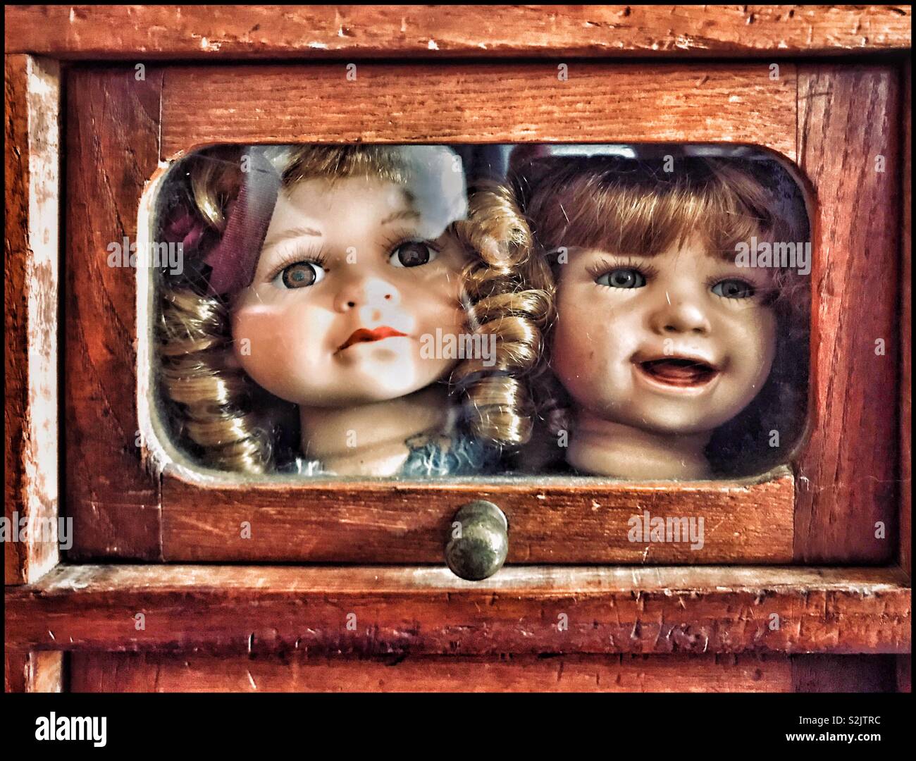 Box of doll heads hi-res stock photography and images - Alamy