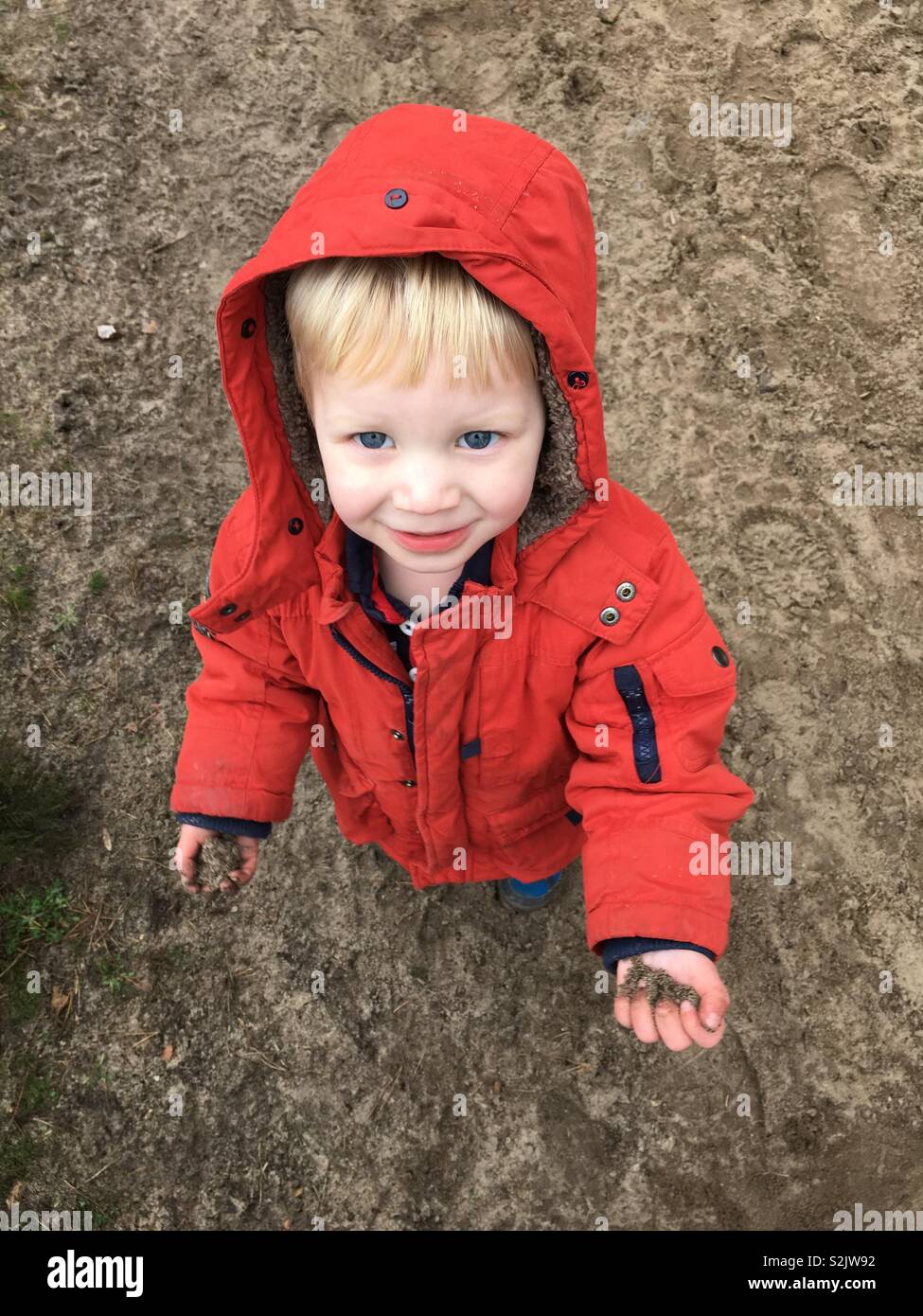 Boy red coat hi-res stock photography and images - Alamy