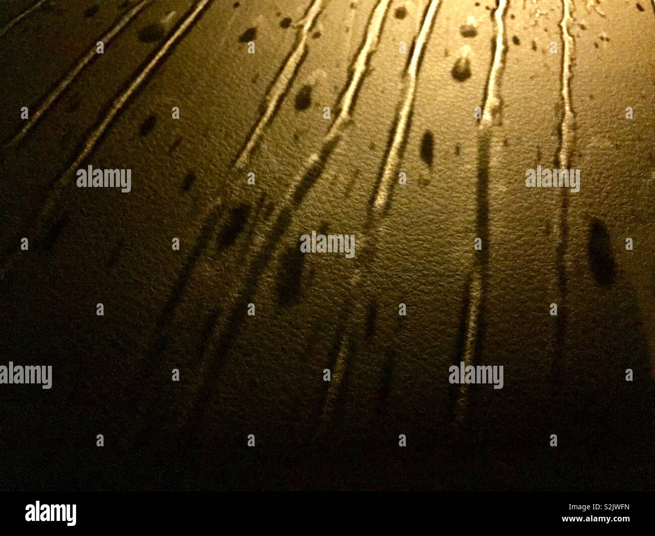 Rain running down the window - life lines Stock Photo - Alamy