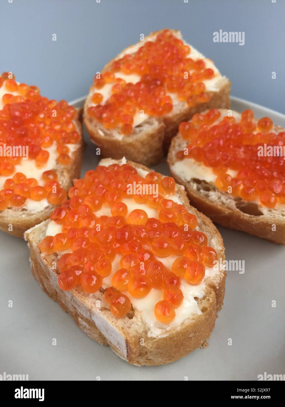 Butter bread with red caviar. Breakfast. Food photography Stock Photo ...