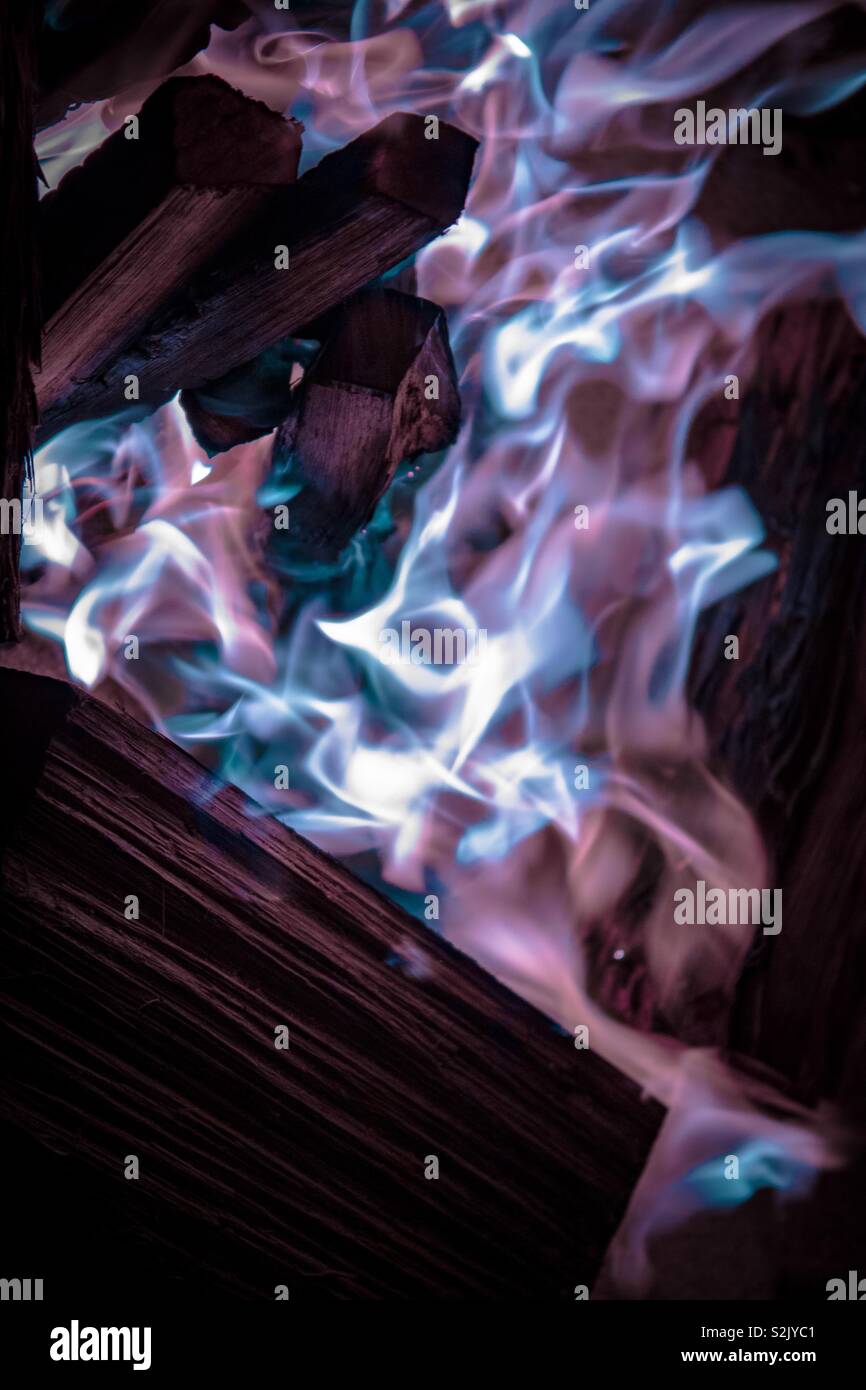 Blue and purple fire Stock Photo - Alamy