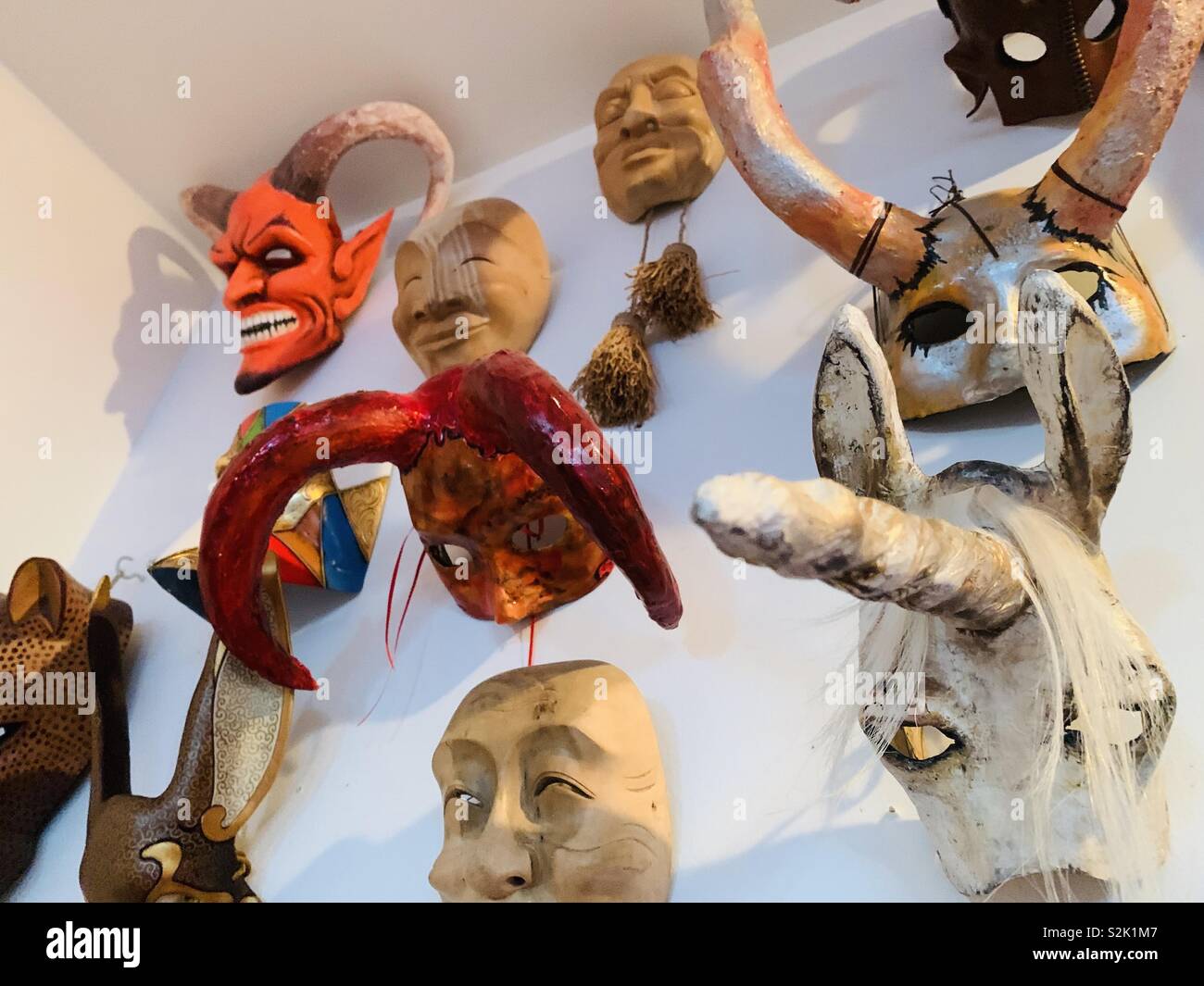 Wall of masks Stock Photo - Alamy