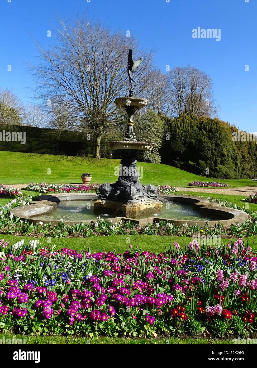 Ornamental fountain in the spring sunshine Stock Photo - Alamy