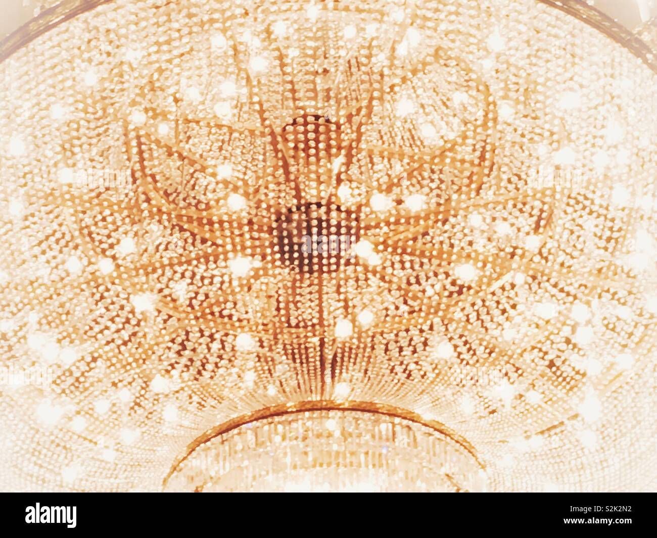 Huge chandelier yellow light hi-res stock photography and images - Alamy