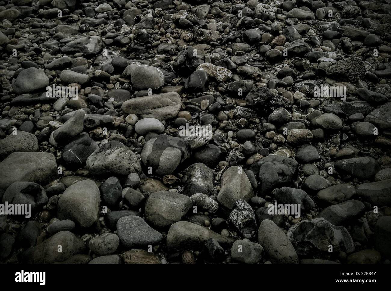 Black beach pebbles hi-res stock photography and images - Alamy
