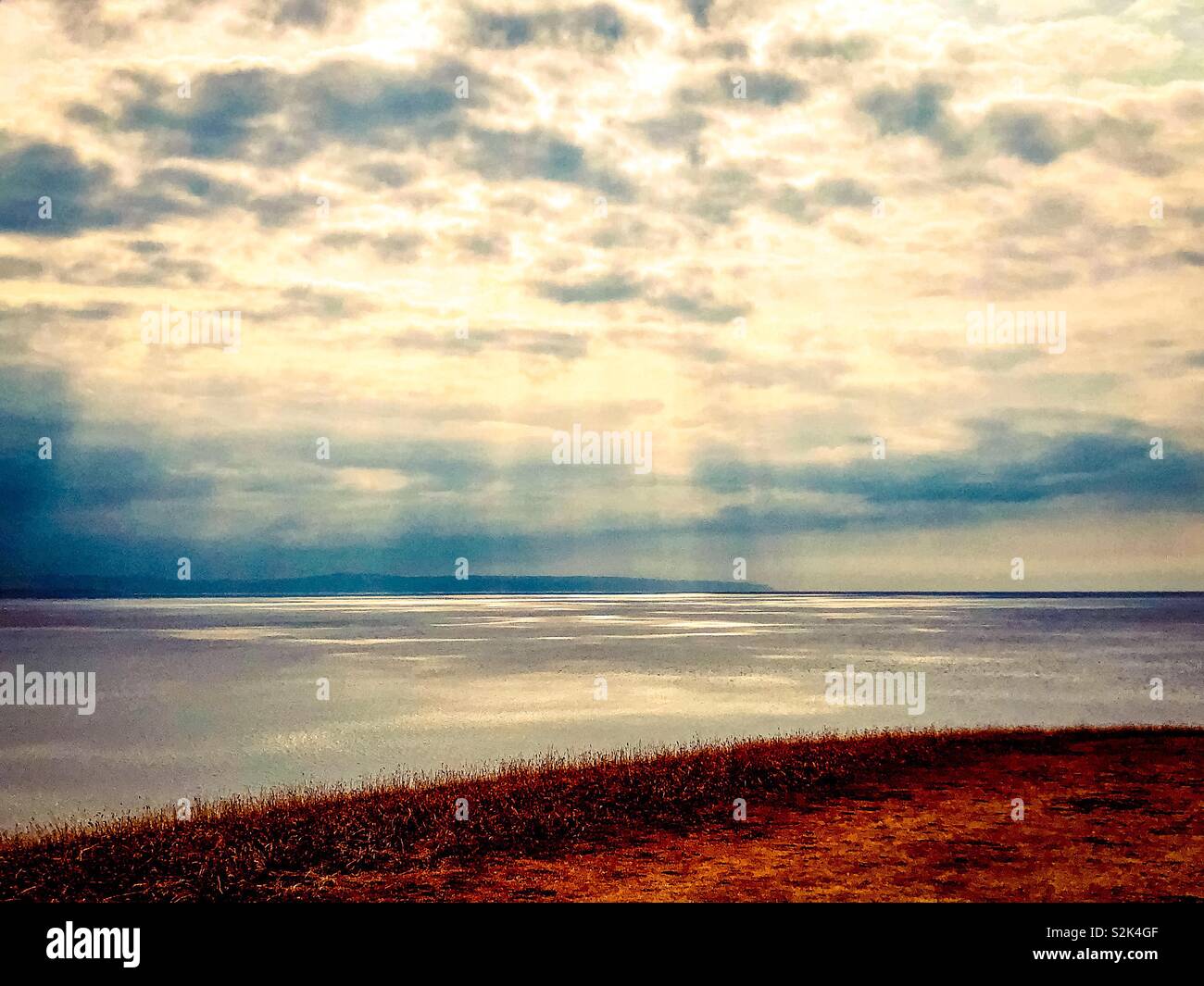 Sunbeams over the ocean hi-res stock photography and images - Alamy