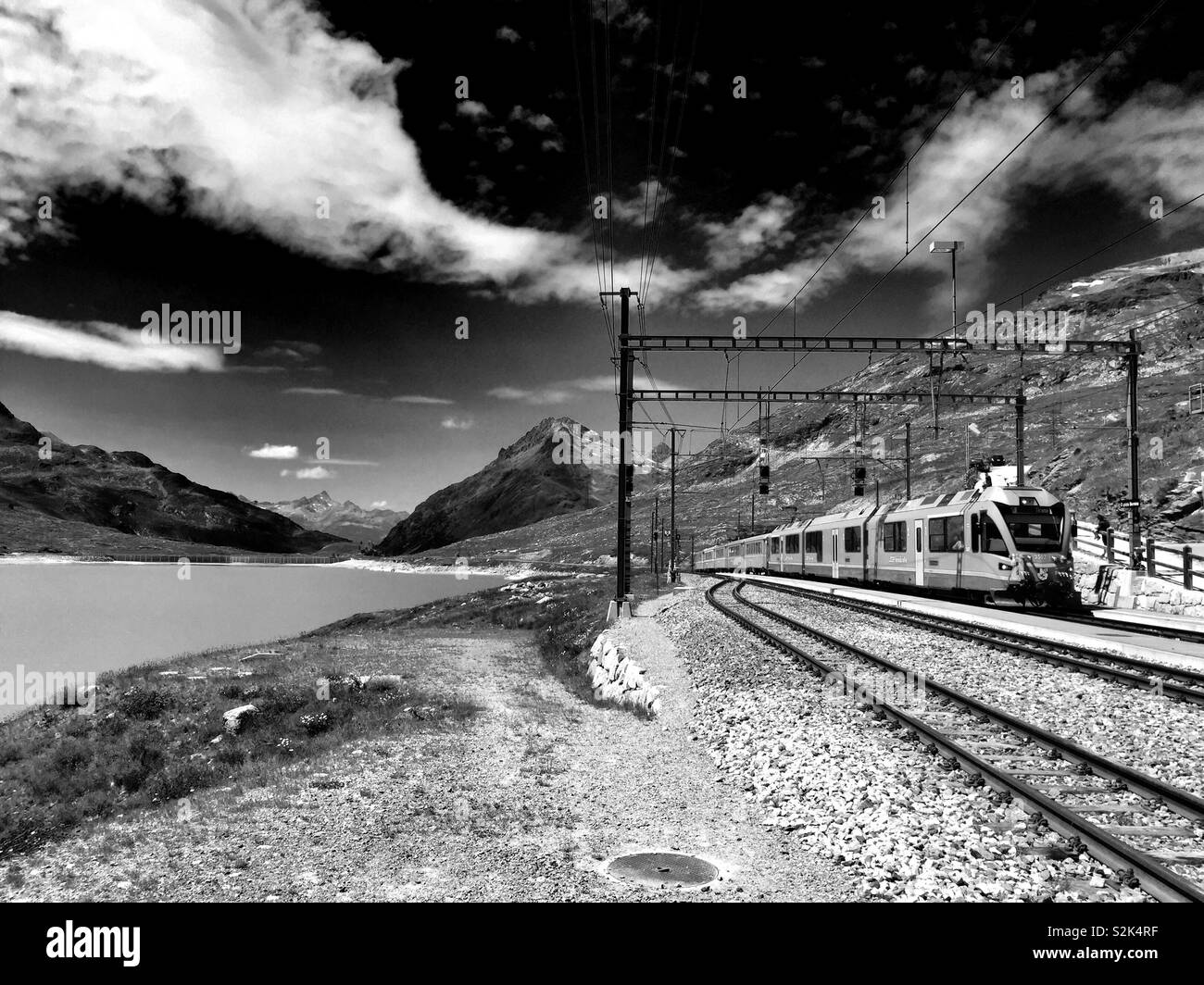 Train on the top of Swiss Alps Stock Photo - Alamy