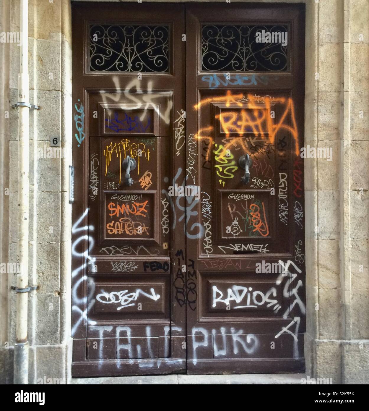 Door graffiti in Barcelona Stock Photo - Alamy