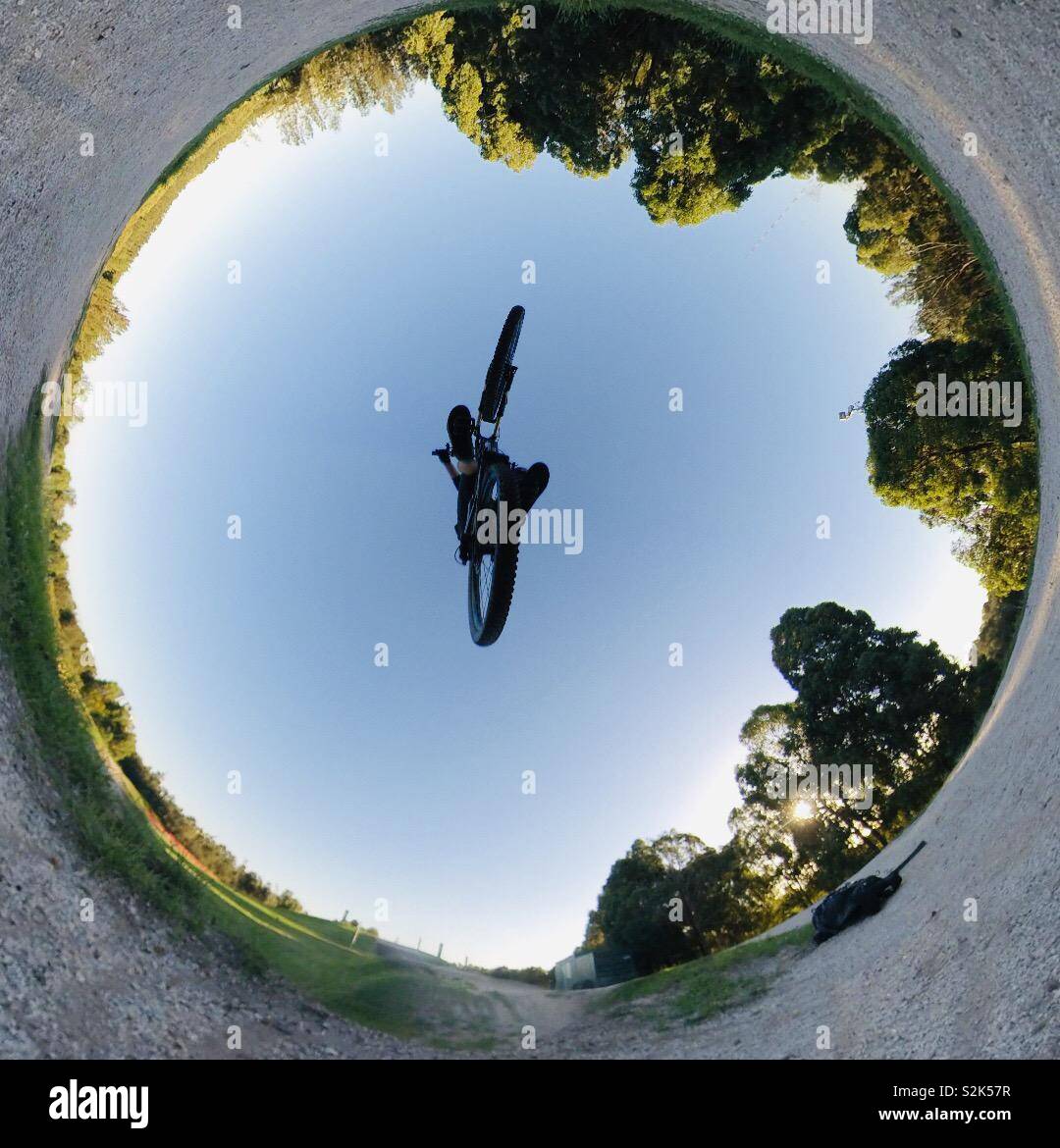 Surreal view of Mountain Bike jump Stock Photo - Alamy