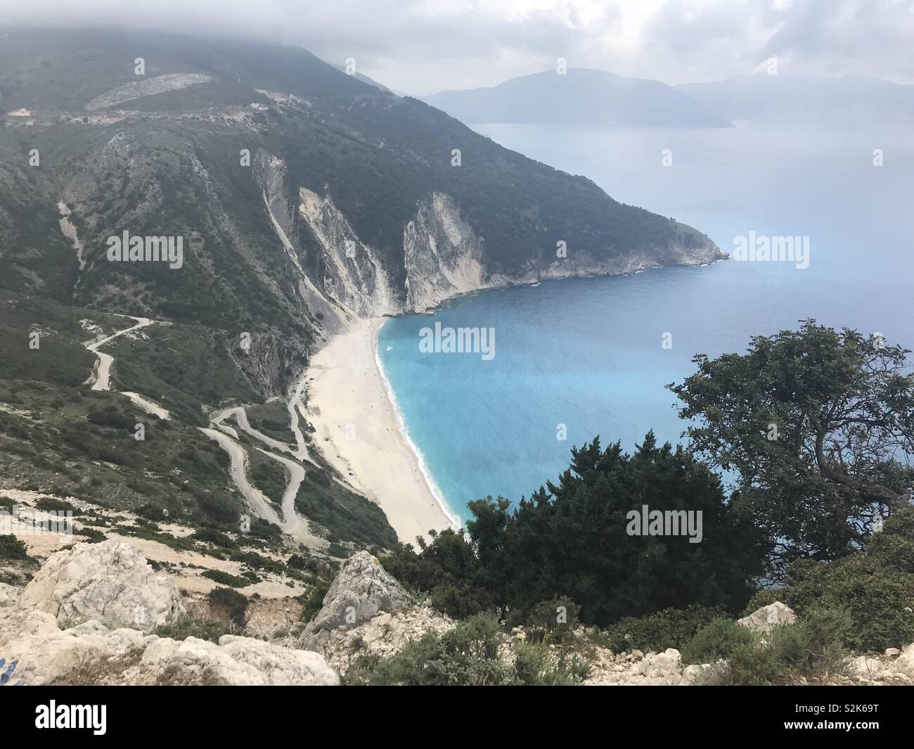 Misty beach perspective view Stock Photo - Alamy