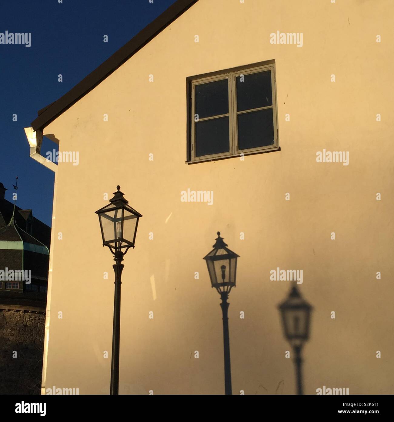 Street lighting and shadow Stock Photo - Alamy