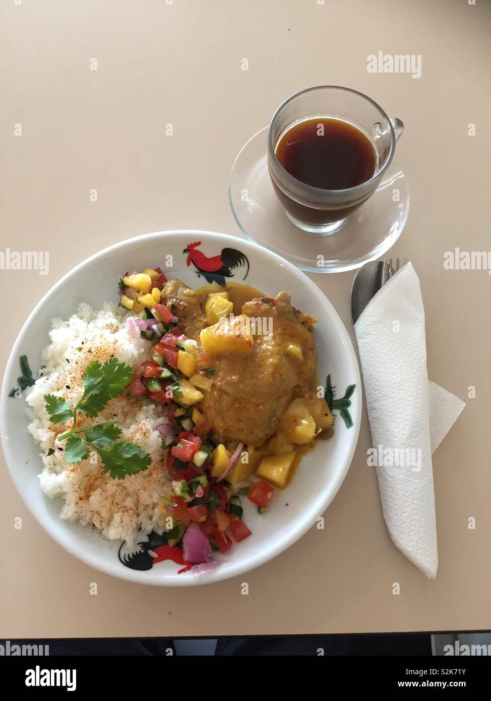 Nyonya rice with pineapple salsa and long black coffee Stock Photo - Alamy