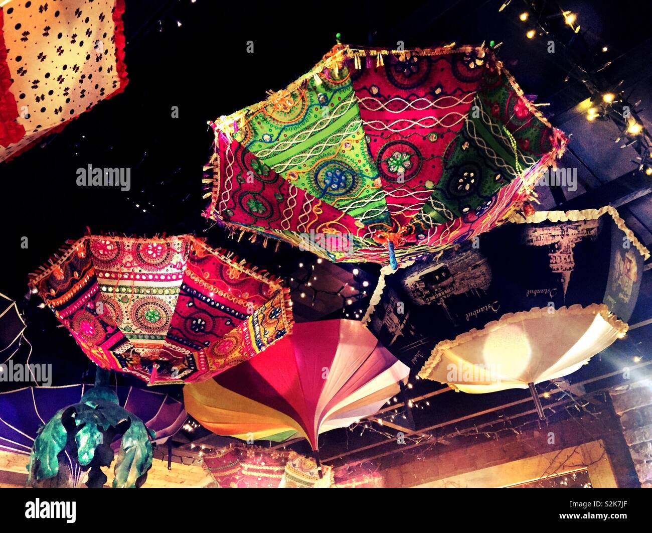 Colourful parasols/umbrellas hanging from ceiling Stock Photo - Alamy