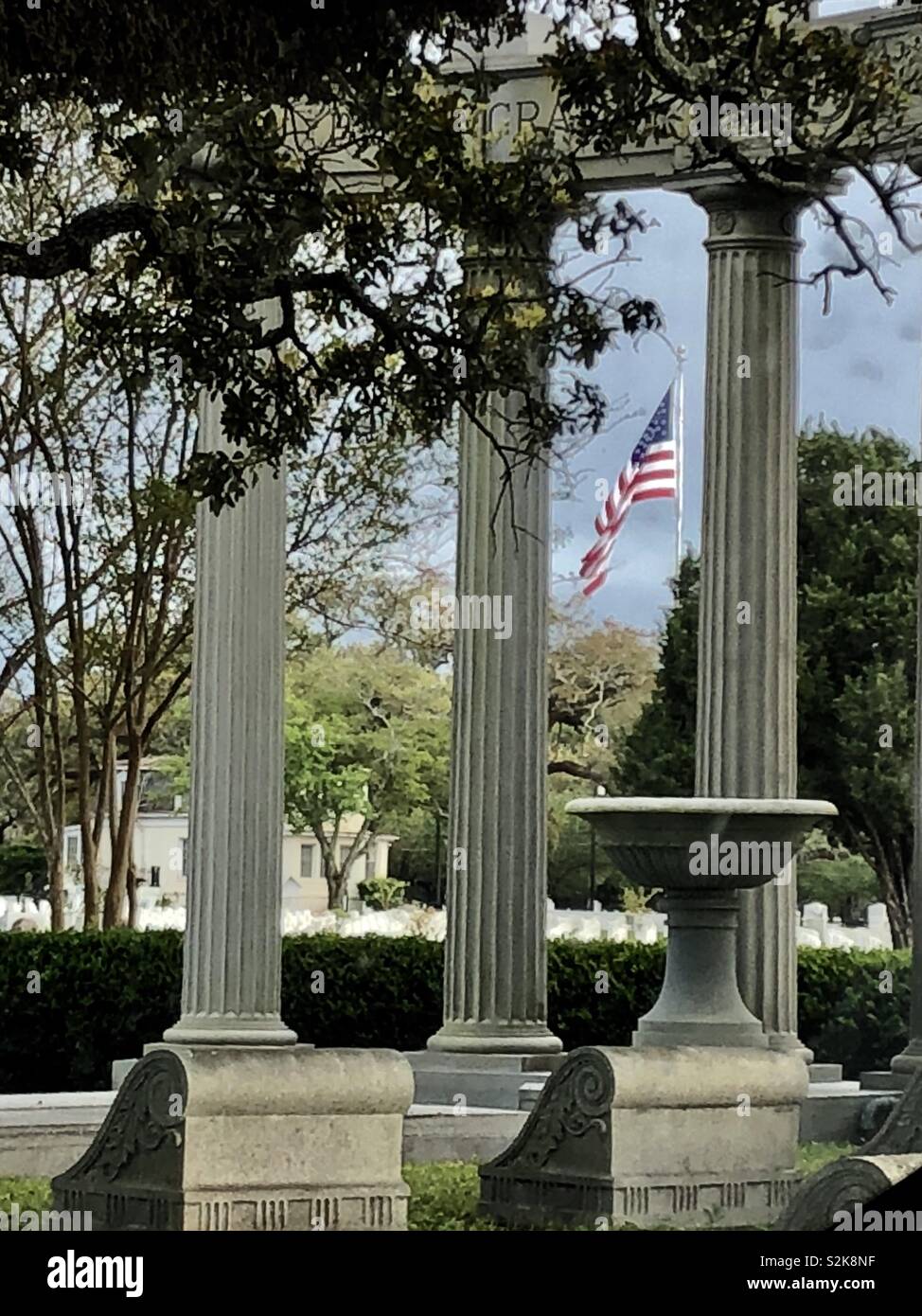American Flag through Classical Memorial, Mobile Alabama Stock Photo ...