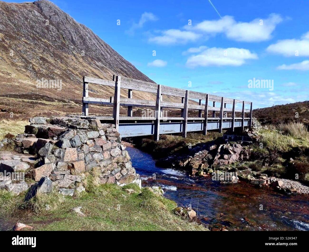 Bridge over stream in Scottish highlands Stock Photo - Alamy
