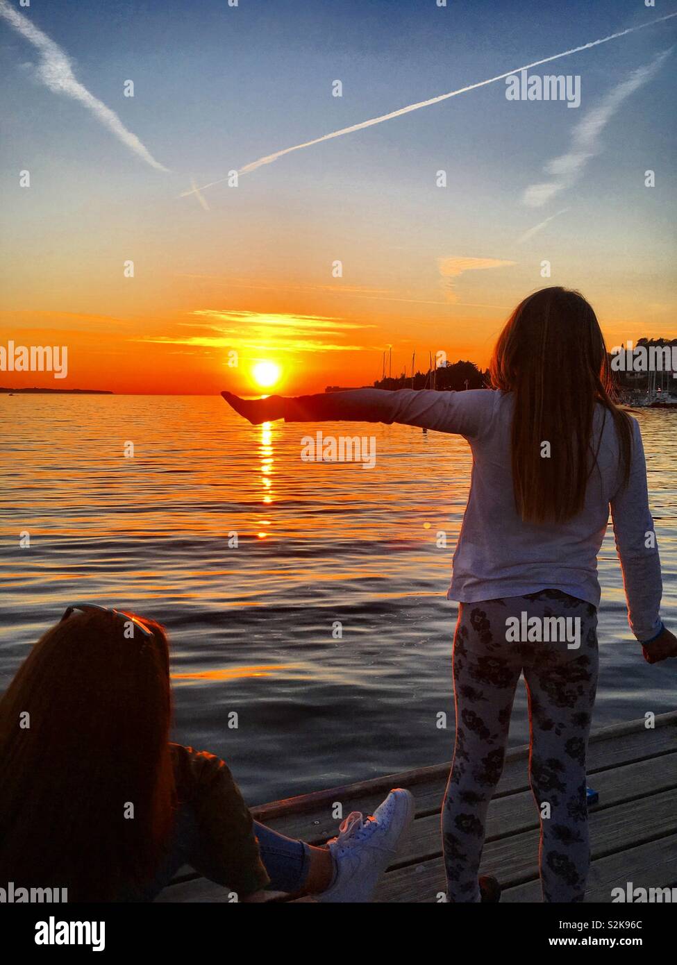 Holding the sun hi-res stock photography and images - Alamy