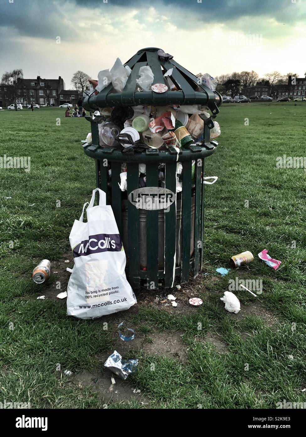 Overflowing litter bin on Blackheath London, England Stock Photo - Alamy