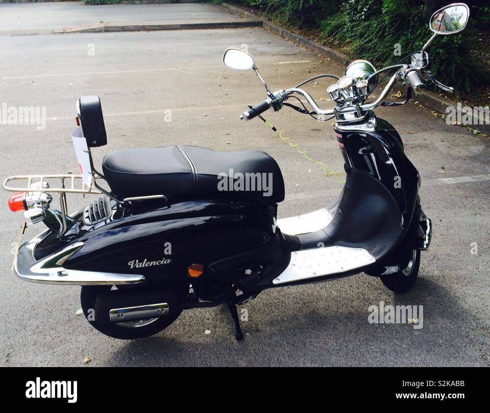 Moped or scooter retro black Stock Photo - Alamy