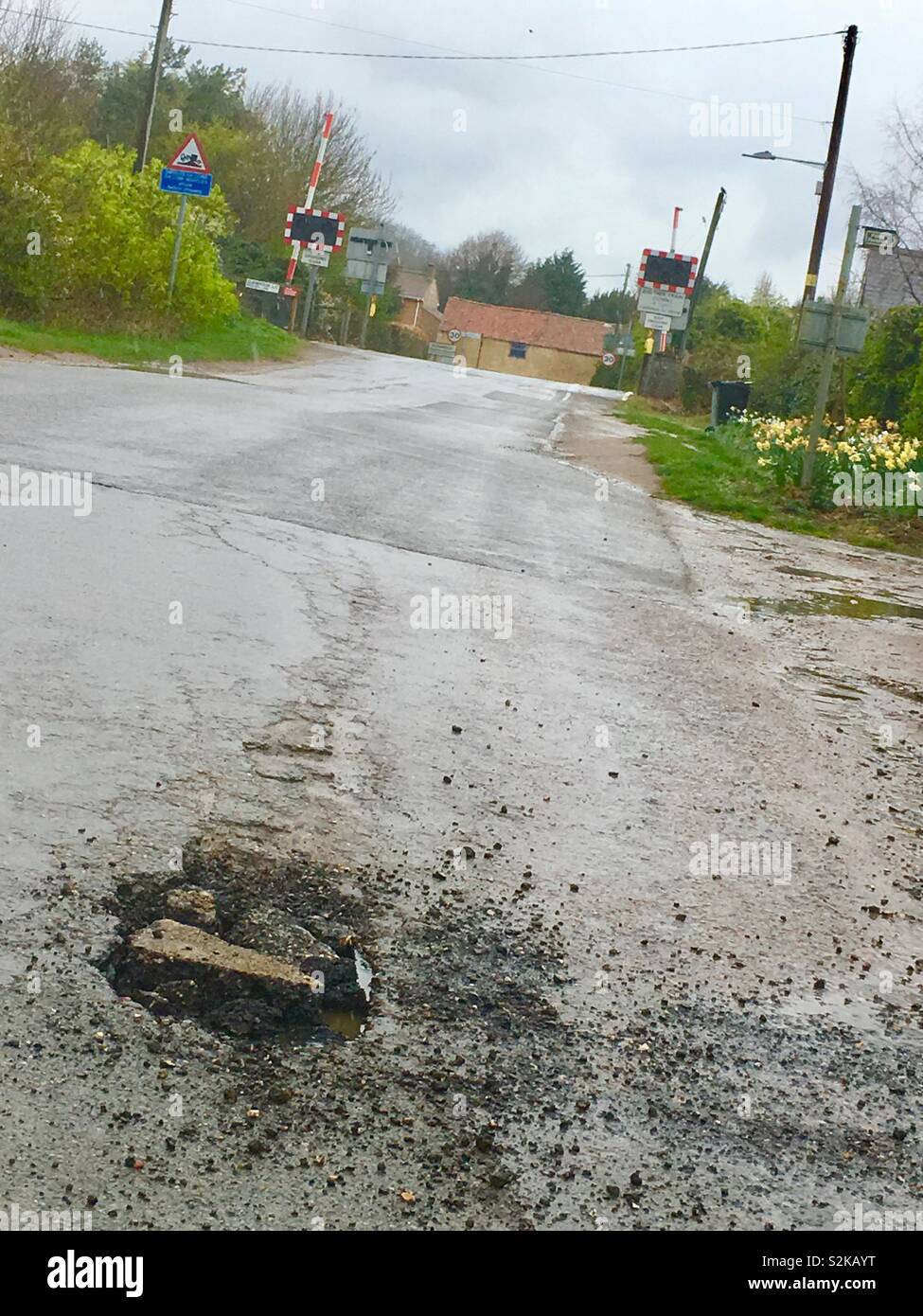 Pothole in Road Stock Photo - Alamy