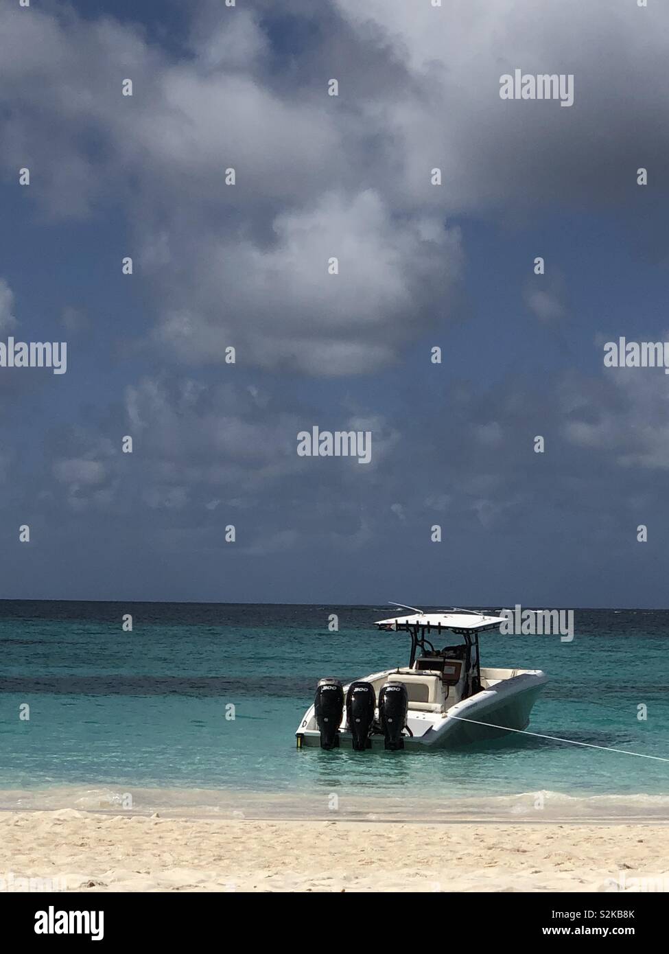 Boat in Anguilla at Shore Bay Stock Photo - Alamy