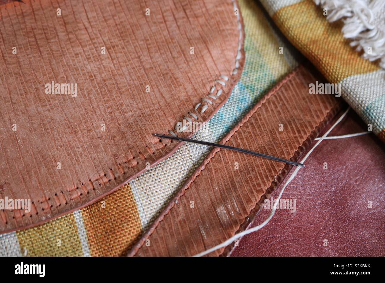 Bag repair hi-res stock photography and images - Alamy
