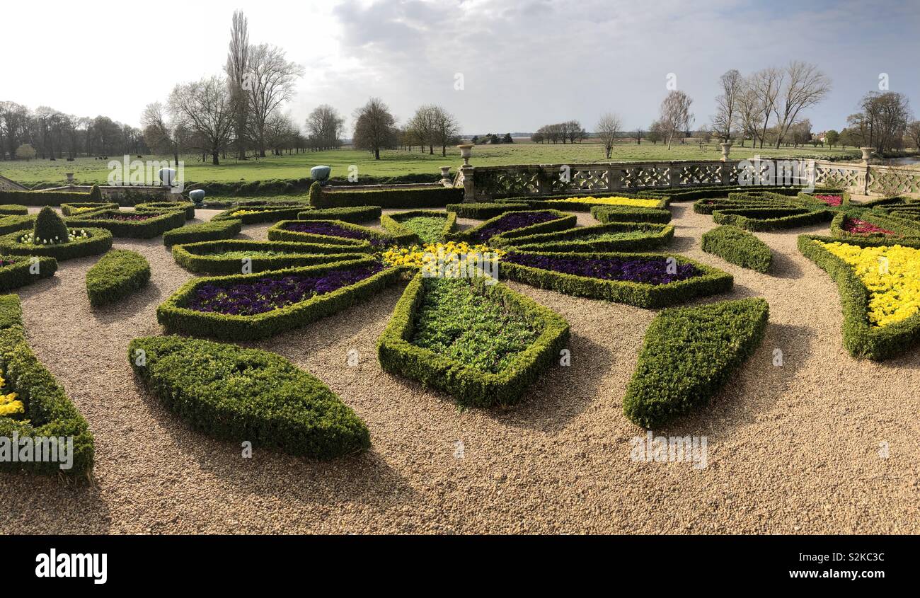 Formal parterre/ Knot garden with spring flowers at a English county ...