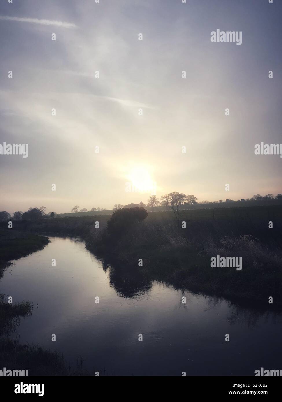 Sunrise over the river in Shropshire on a cold spring morning Stock ...