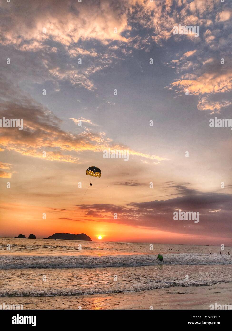 The sun sets on the horizon in Costa Rica Stock Photo - Alamy
