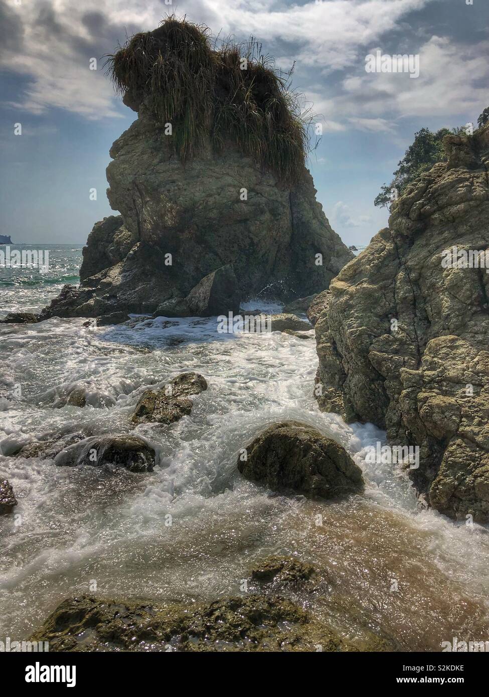 Rock formations on a beach in Manuel Antonio National Park, Costa Rica ...