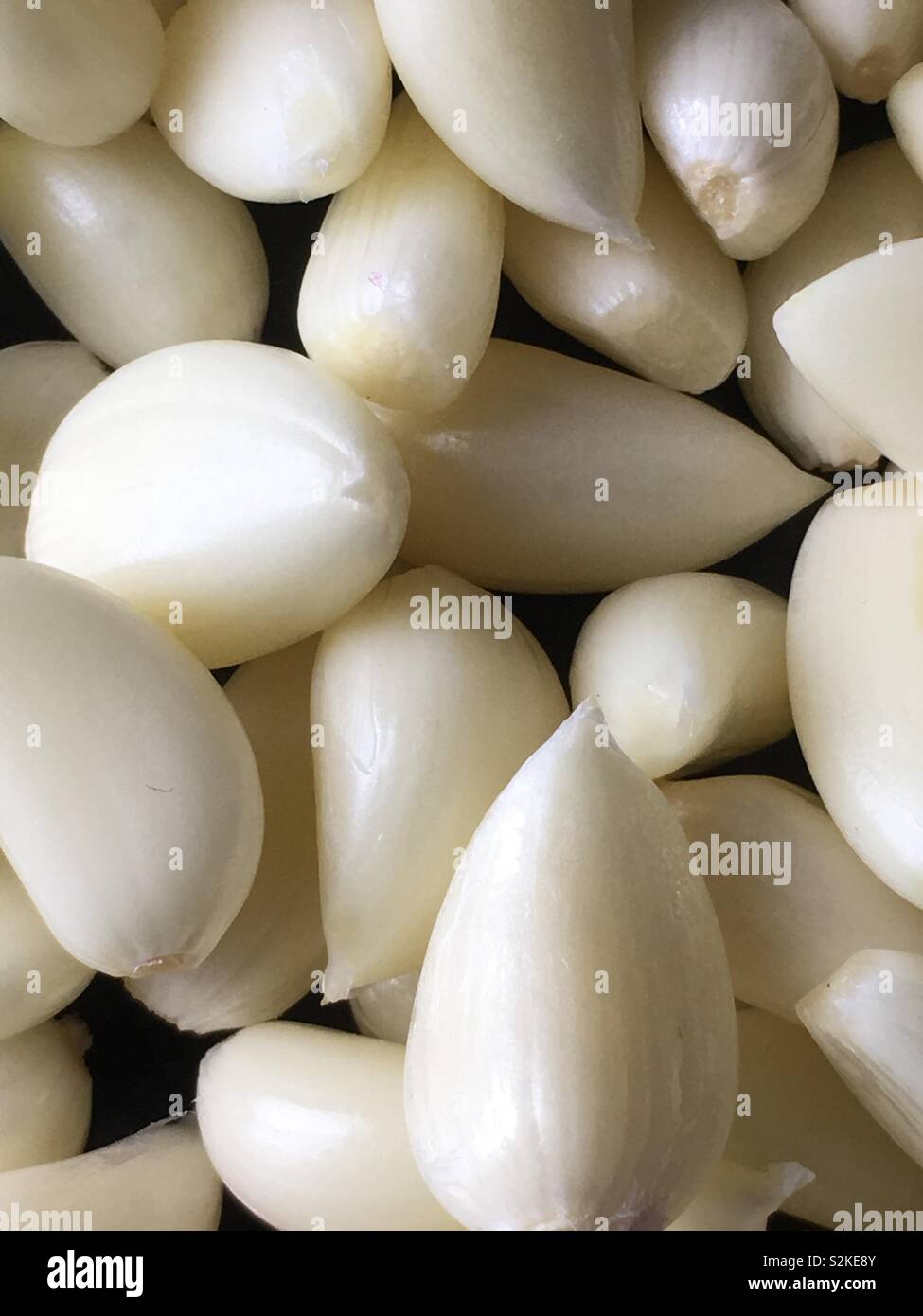Pealed garlic hi-res stock photography and images - Alamy