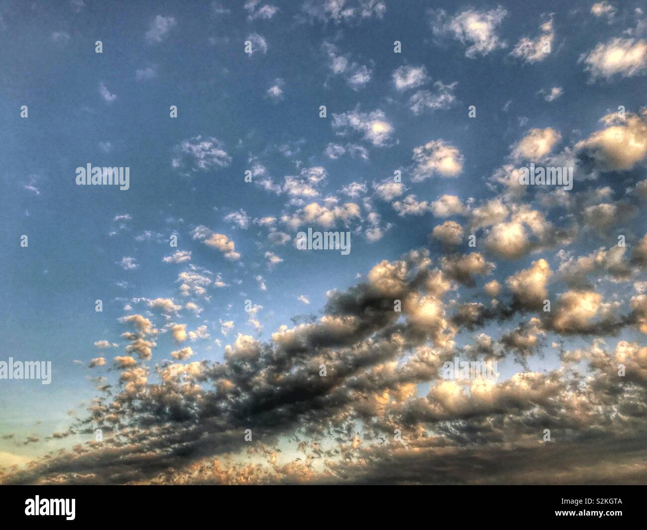 Atmospheric shot fluffy clouds hi-res stock photography and images - Alamy