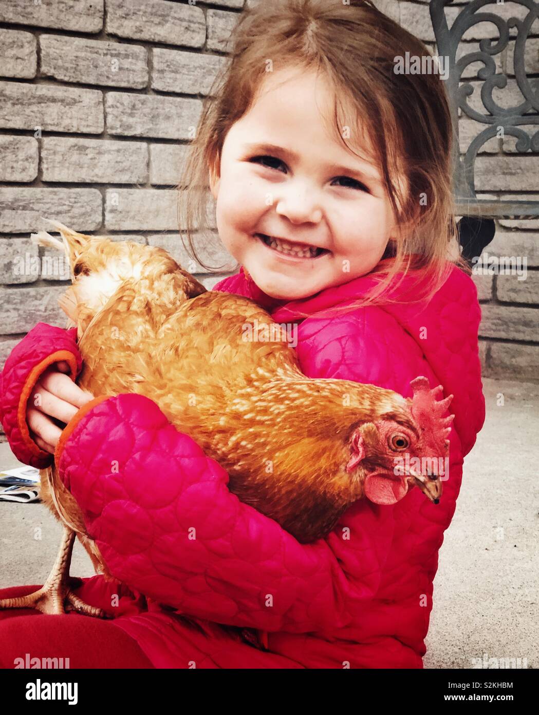 Girl with hen hi-res stock photography and images - Alamy
