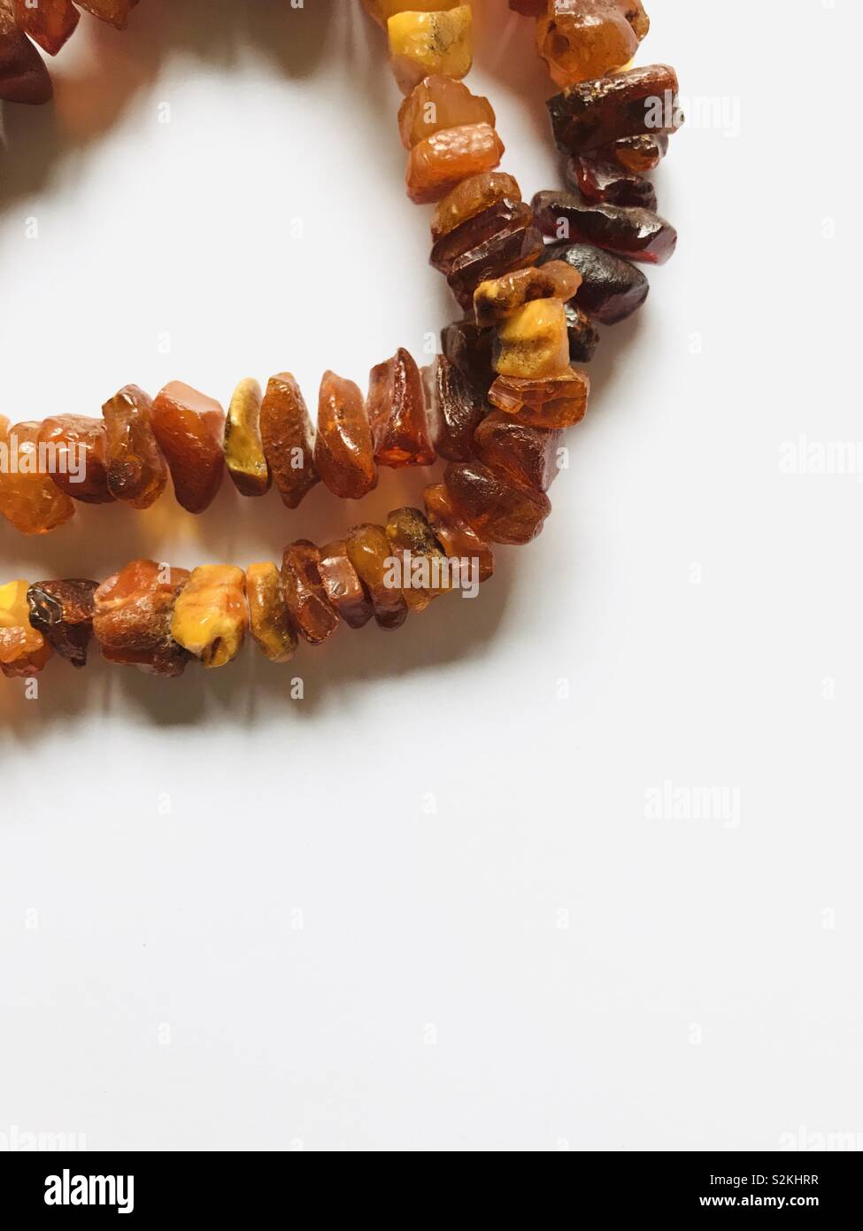 Irregular Baltic Amber Bead necklace Stock Photo - Alamy
