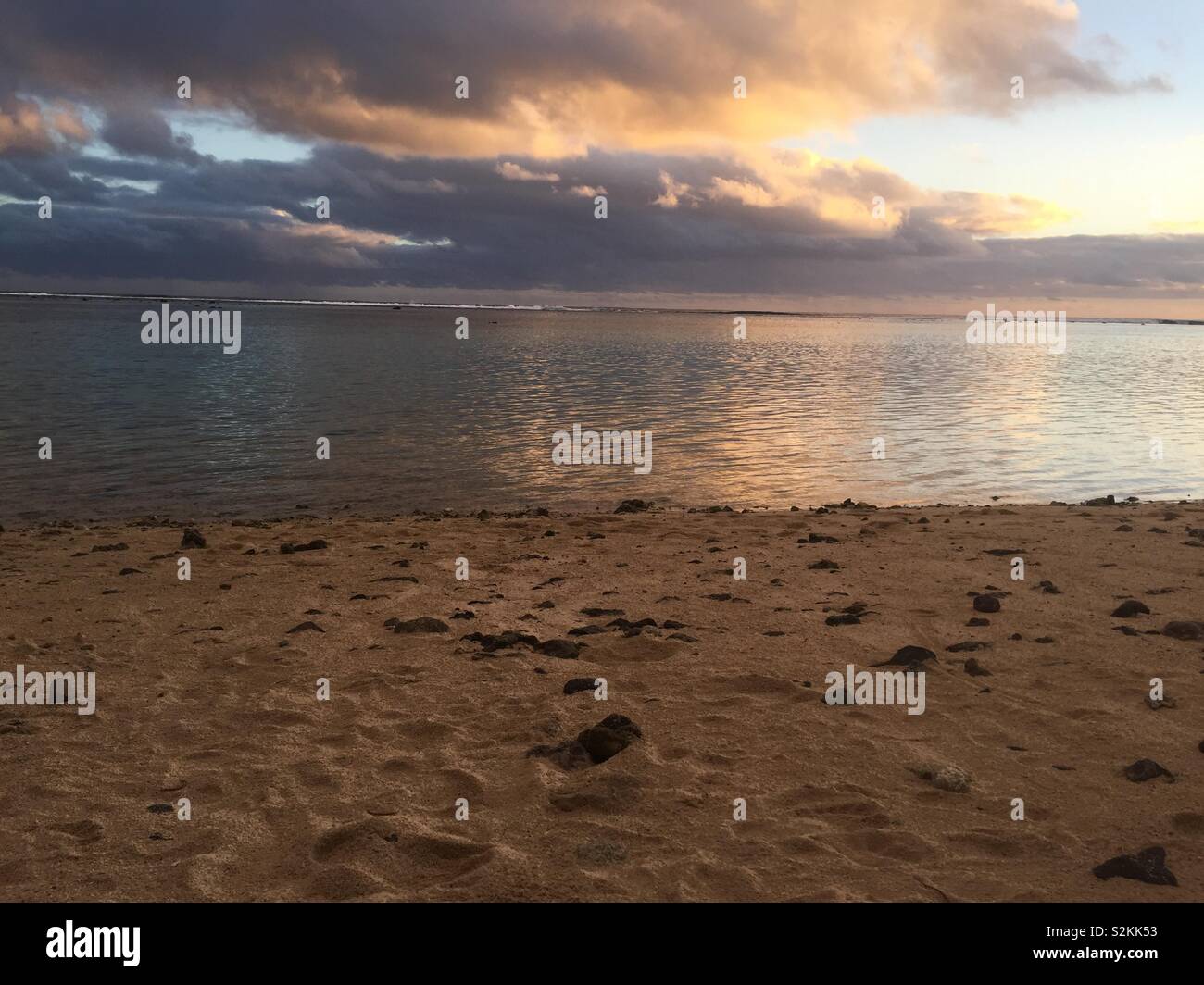 Cloudy sunset over ocean, Rarotonga, Cook Islands Stock Photo - Alamy