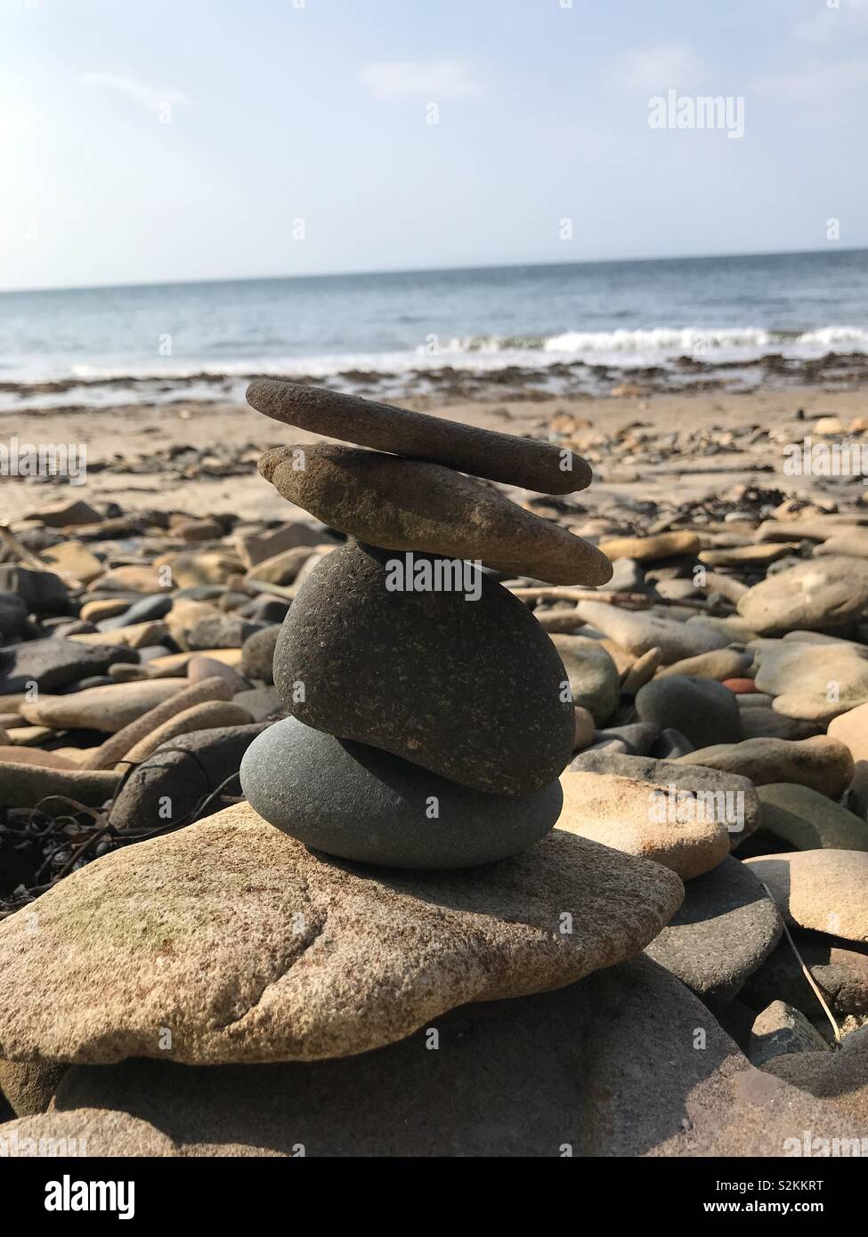 Rocks on the beach Stock Photo - Alamy
