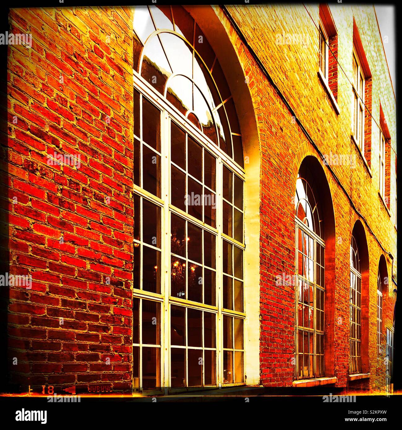 Arched windows in brick building Stock Photo - Alamy