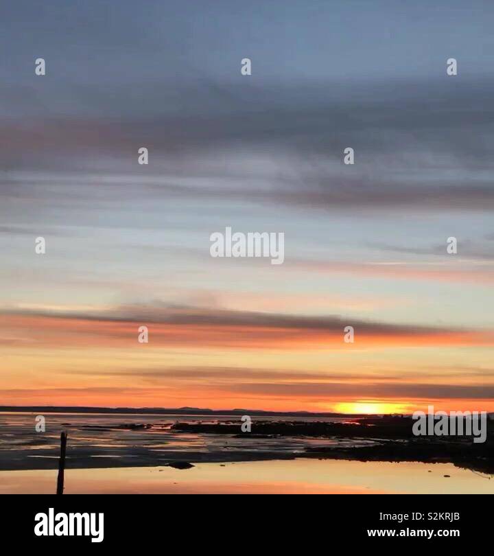 Sunset glow at beach Stock Photo - Alamy