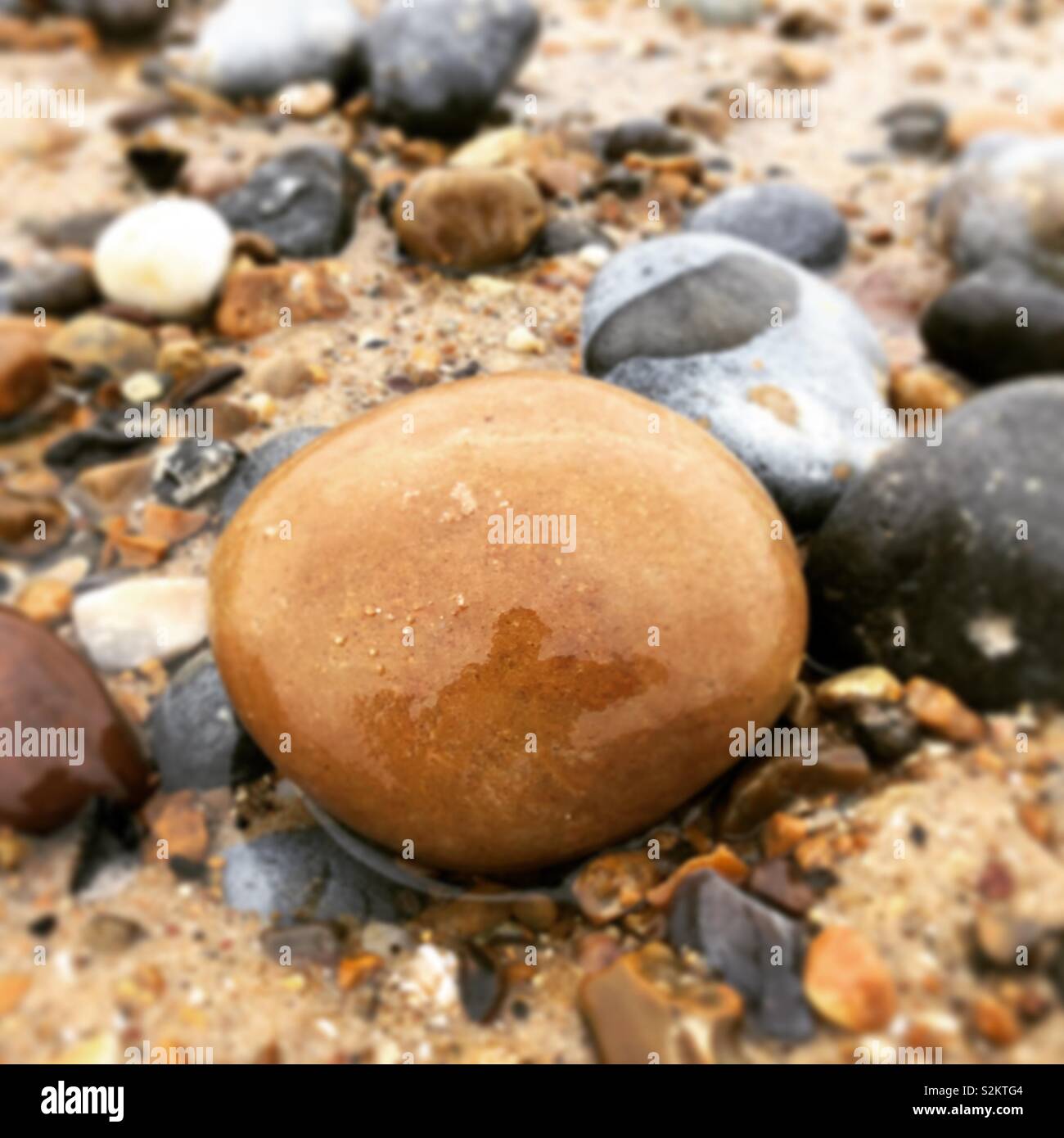 Shiny beach stones hi-res stock photography and images - Alamy